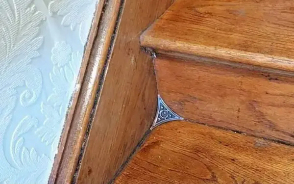 The Genius Hack for Dust-Free Stair Corners