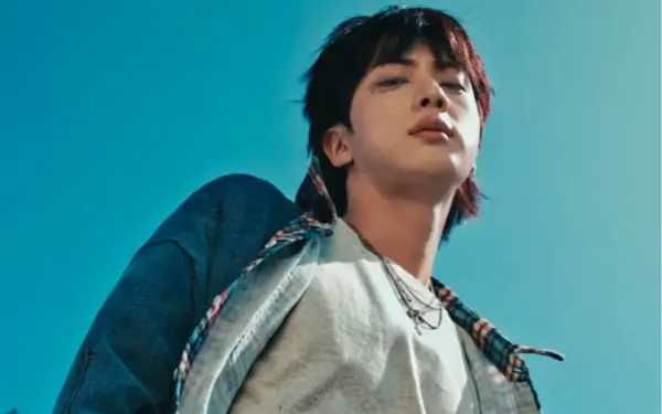 Watch: BTS's Jin Delivers Strength With MV For Heartwarming Pre-Release Single "I'll Be There"