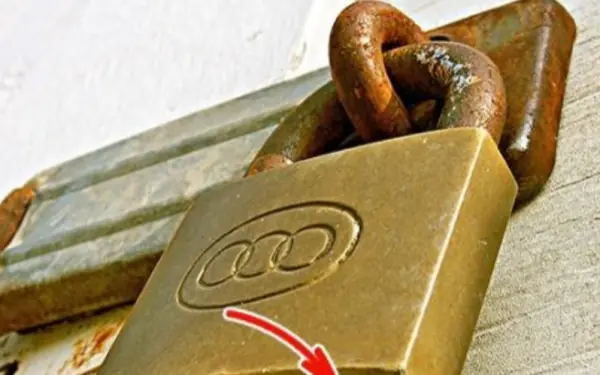 What is the function of this small hole in the lock?